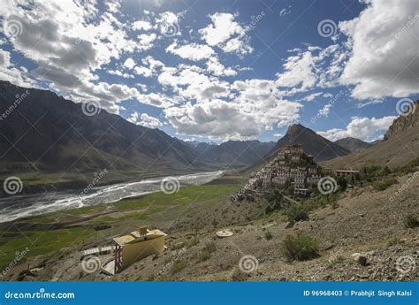 A Monk Taking Picture Of Kye Monastery Or Ki Monastery With His Mobile
