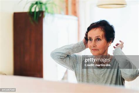 Old Lady Looking In Mirror Photos And Premium High Res Pictures Getty
