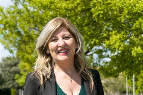 Happy Mature Blonde Woman Smiling On The Park Stock Image Image Of