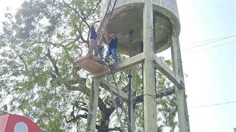 Man Atop Water Tank In Gujarats Chhota Udepur Threatens Suicide Slips