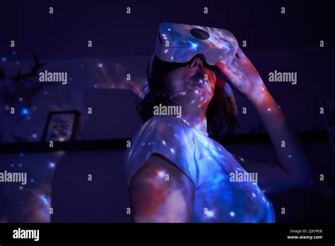 Woman Is Using Virtual Reality Headset Elements Of This Image Furnished By Nasa Concept Of