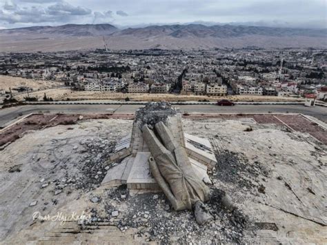 The Fallen Assad Statue In Deir Atiyah A Call To Preserve Syrian