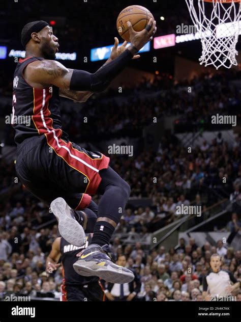 Miami Heat Forward LeBron James Shoots Against The San Antonio Spurs