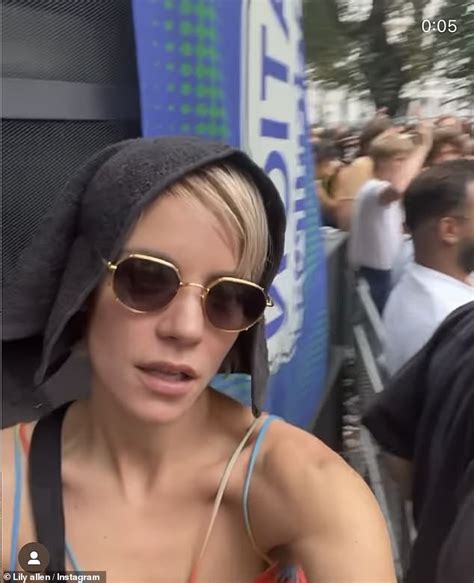Lily Allen Sports A Grey Tea Towel On Her Head And Sunglasses As A Disguise While Going
