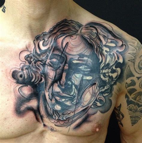 Sketch Style Colored Chest Tattoo Of Human Face With Hair