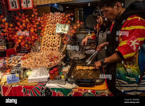 Cooking Shrimp Skewers At A Seafood Stall Nishiki Market Kyoto Japan
