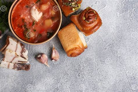 Delicious Borsch Served With Pampushky And Salo On Grey Textured Table