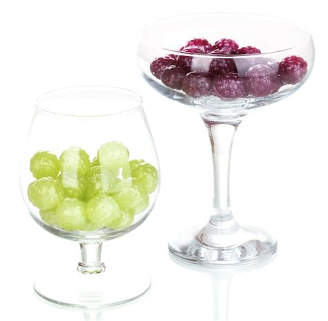 Premium Photo Color Candies In Glasses Isolated On White