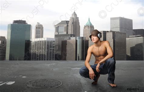 Naked Chest Boy Listening Music In A City Street Stock Photo Crushpixel
