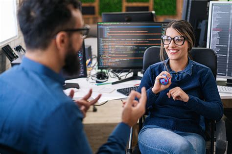 Software Programmers Analyzing Html Code And Database Brainstorming Script Ideas To Develop New