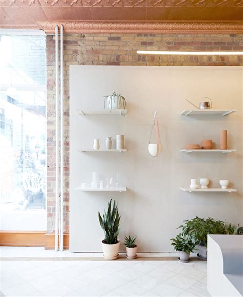 Toronto Flower Shop By Msds Studio Features Pale Walls And Linoleum Covered Furniture