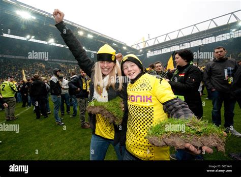 Fans Of Dortmund Celebrate Their Team After The Bundesliga Soccer Match