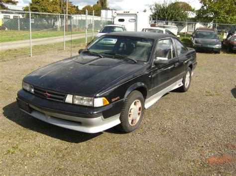 Dueling Horsemen 1985 Chevy Cavalier Convertible Vs 1990 Chevy