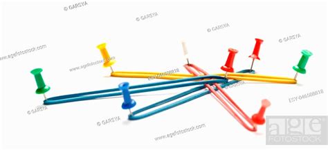 Colorful Paper Pins Attached To White Paper Stock Photo Picture And Low Budget Royalty Free