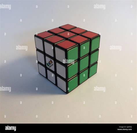 A Closeup Shot Of A Solved Rubik S Cube On White Background Stock Photo