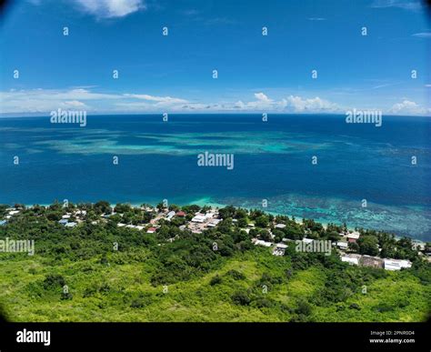 Aerial View Of Tropical Island With Clear Blue Water In Torres Strait