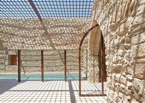 Arquitectura G Renovates Spanish Farmhouse With Glazed Tiles