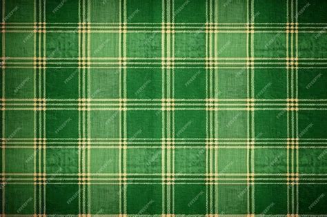 Premium Ai Image Green Plaid Fabric With A Dark Green Background