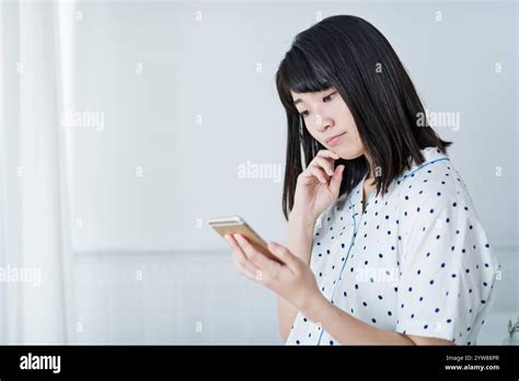 Woman Mobile Phone Troubleshooting Stock Photo Alamy
