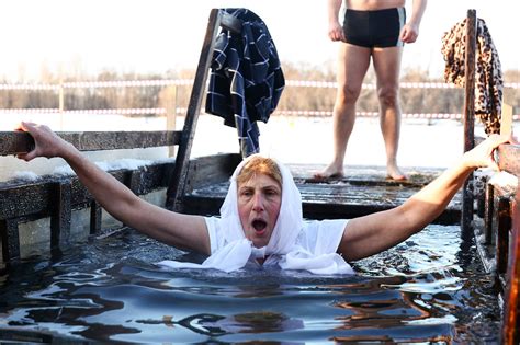 In Photos Russians Celebrate Epiphany By Plunging Into Freezing Waters
