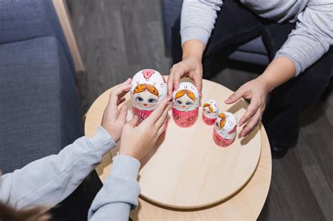 Cutout Of Teenage Girl And Psychotherapist Woman S Hands During A