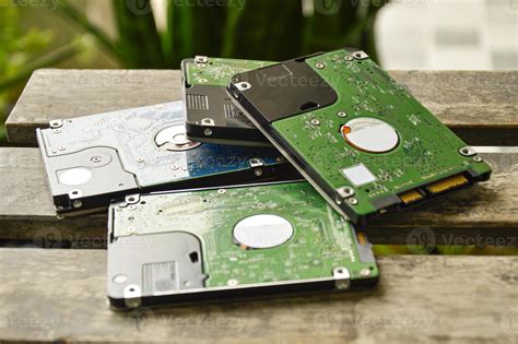 2 5 Inch Hard Drives Stacked On Top Of Each Other Currently Still