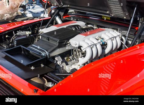 Close Up Detail Of The Tipo F113 Flat 12 Engine In A Rosso Corsa Red