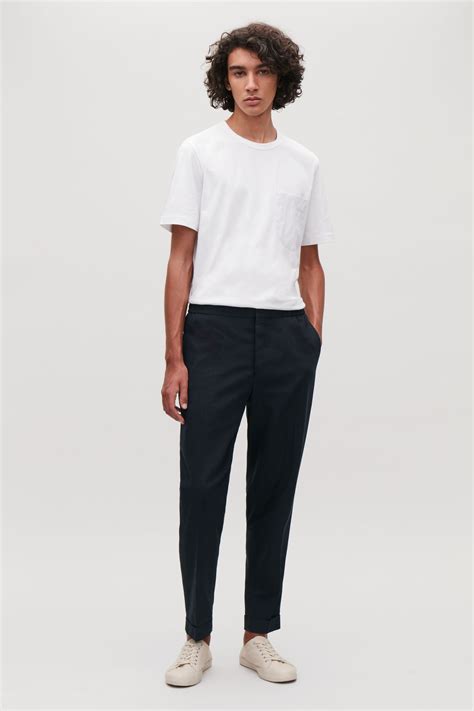 Relaxed Turn Up Trousers Made From Lightweight Cotton Witht A Hint Of