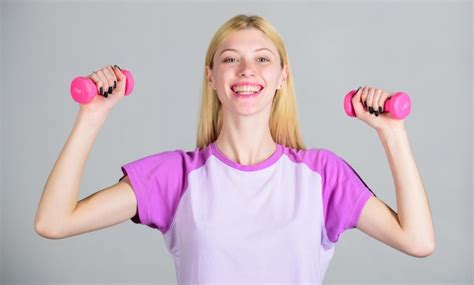 Premium Photo Workout With Dumbbell Biceps Exercises For Female Girl