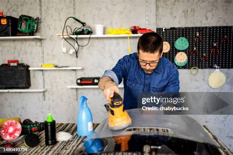 Man Cleaning Motorbike Photos And Premium High Res Pictures Getty Images