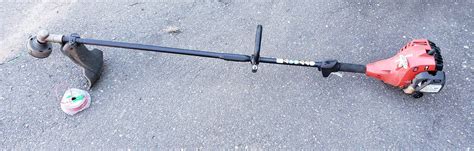 Homelite Gas Trimmer With Trimmer String Reel 12454 Auctionninja Com