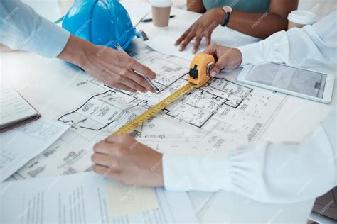 Premium Photo Architecture Hands Blueprint Design And Tape Measure For Construction Scale