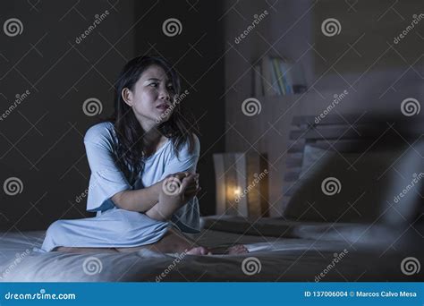 Dramatic Portrait Of Young Beautiful And Sad Asian Japanese Woman