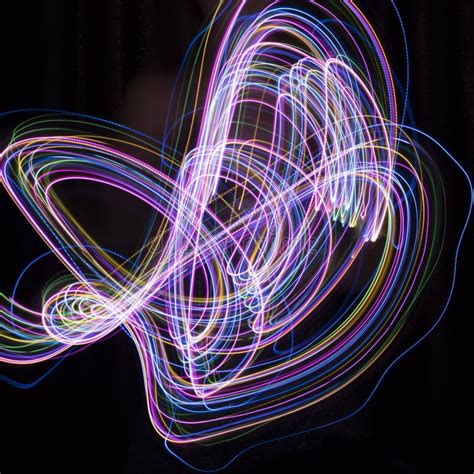 Multicolored Lines On A Black Background Shooting A Multicolored