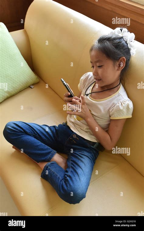 Laos Girl With Mobile Phone Stock Photo Alamy