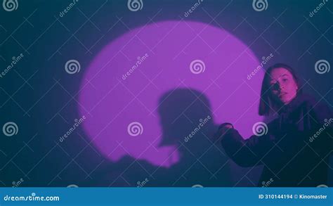 Girl S Energetic Hip Hop Dance In Front Of A Vivid Colorful Spotlight