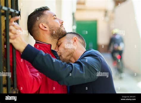 Gay Couple Hugging In A Romantic Moment Homosexual Relationship