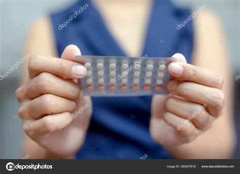 Woman Holding Combined Oral Contraceptive Pill Gynecology Concept Stock