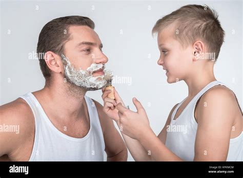 Father And Son Shaving Together Stock Photo Alamy