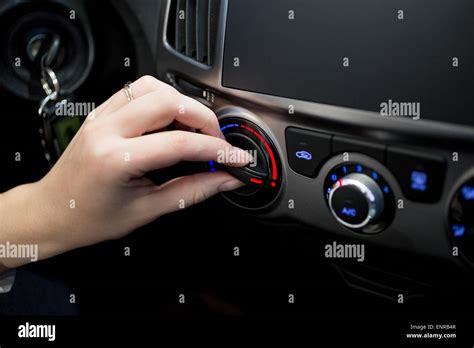 Closeup Photo Of Woman Adjusting Car Conditioner Temperature Stock Photo Alamy