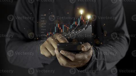businessman use virtual increasing technical graph and up arrow for trader analysis stock