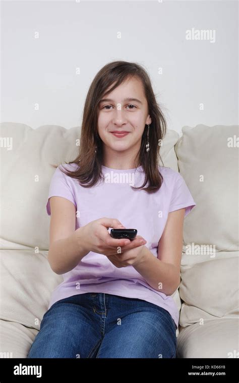 Girl With TV Remote Control Stock Photo Alamy