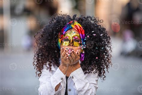 Carnaval Party Brazilian Curly Hair Woman In Costume Blowing Confetti