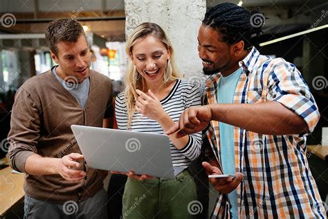 Programmers Working In A Software Developing Company Office Stock Image