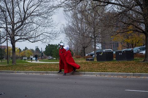 Photos Women Dressed As Handmaids Protest Mike Pences Colorado Visit