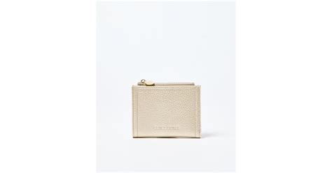 Oliver Bonas Kinley Gold Zip Around Coin Purse In Natural Lyst Uk