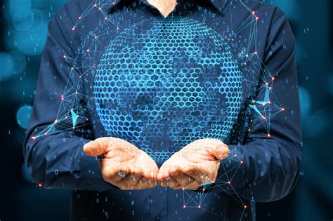 close up of businessman hands holding abstract globe sphere with coding