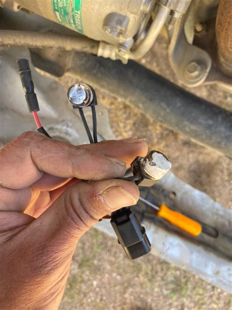 Replacing A Honda Thermal Protector Into The AC Compressor That Had A