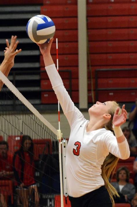 A Freshman Middle Blocker On The Volleyball Team Tips The Ball Against