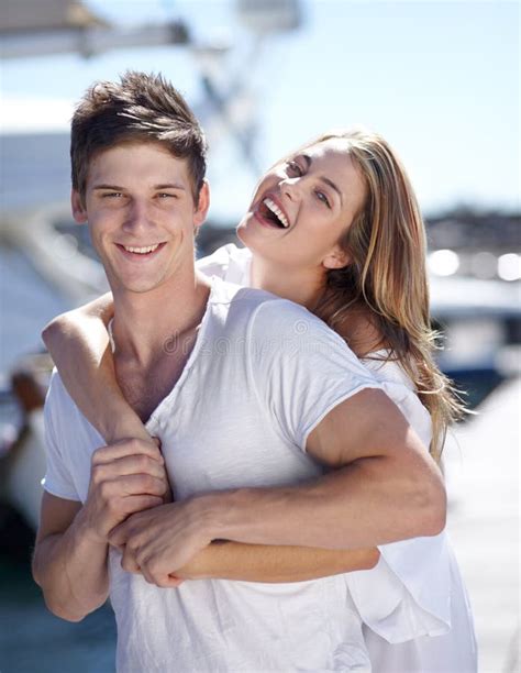 Hes Swept Me Off My Feet Romantic Young Couple Standing Together In